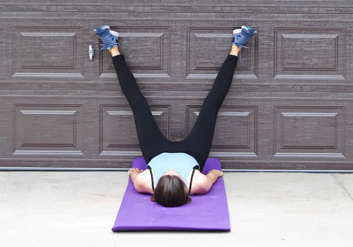 4 Spinal Stretches You Can Do Against a Wall | Fitness